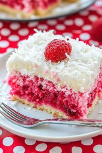 Raspberry Zinger Poke Cake - Dessert Hungry